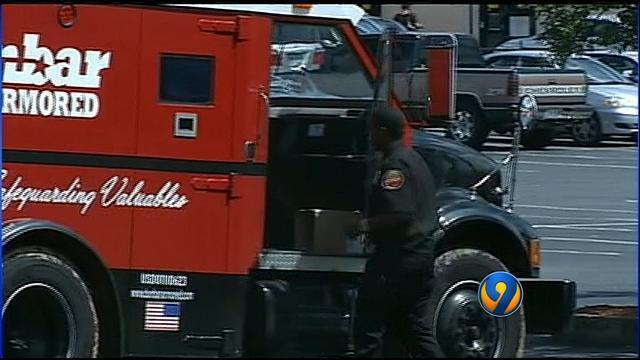 CMPD: Robber holds up armored car employee, runs into woods | WSOC-TV