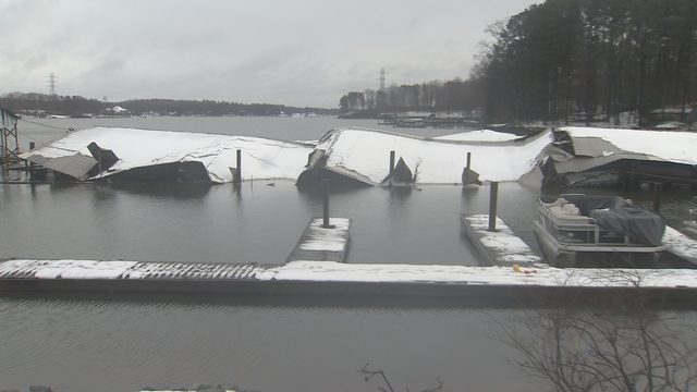 SNOW CAUSES DOCK TO COLLAPSE: 20 boats crushed after snow causes Lake ...
